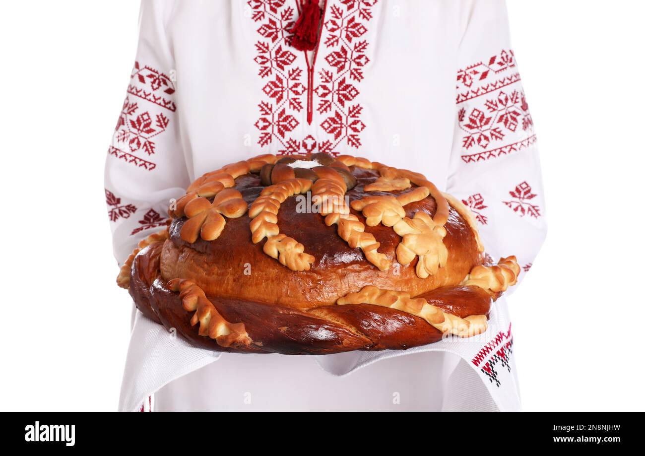 Woman with korovai on white background, closeup. Ukrainian bread and ...