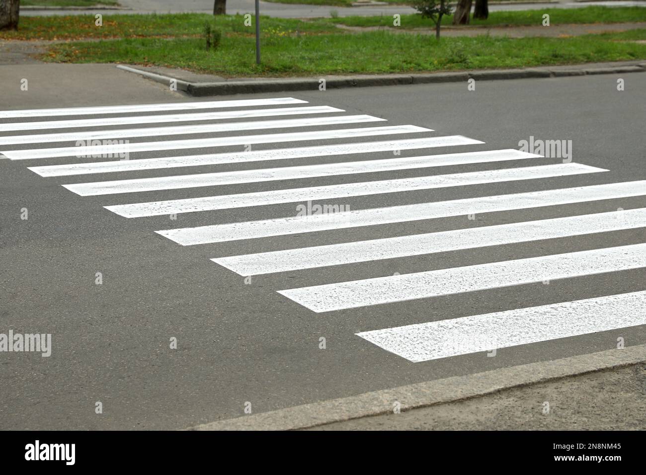 Pedestrian crossing on empty city street, closeup Stock Photo - Alamy