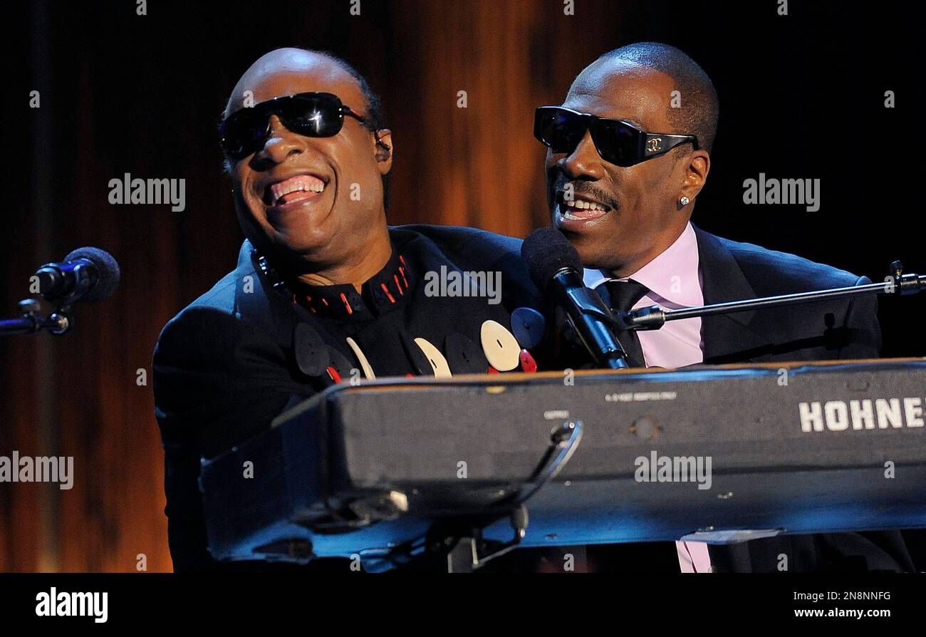 Stevie Wonder, left, is joined by Eddie Murphy to sing Wonder's song ...