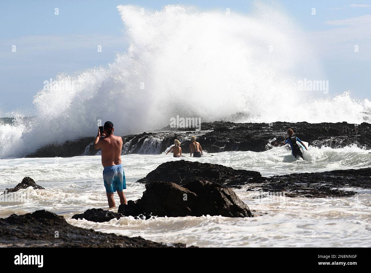 Surfers are seen at Snapper Rocks on the Gold Coast , Sunday, February ...