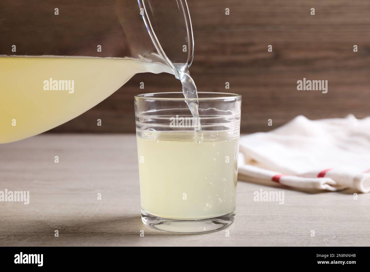 Pouring juice pitcher glass hi-res stock photography and images - Alamy
