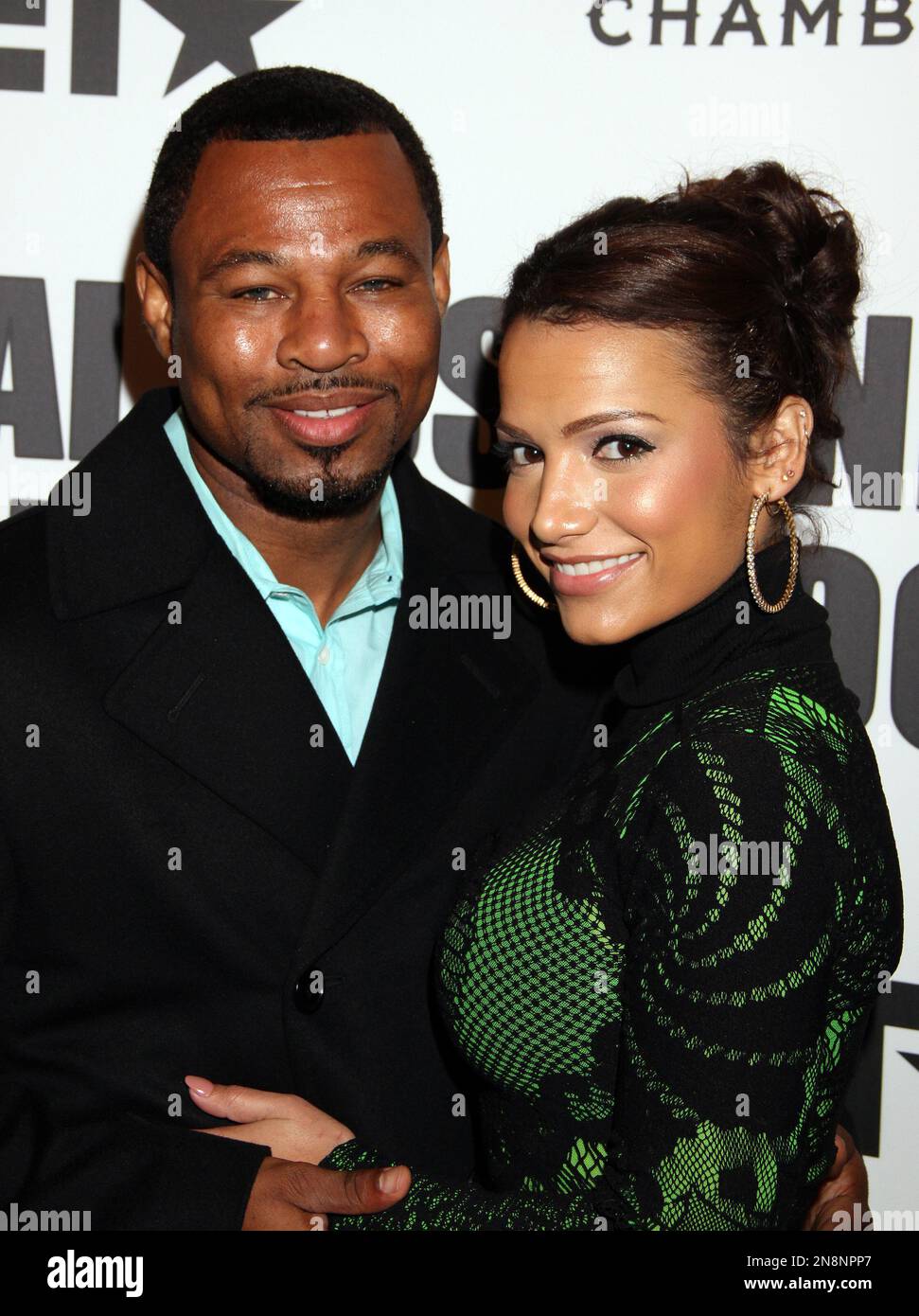 Boxer Sugar Shane Mosley and model Bella Gonzalez attend BET Real ...