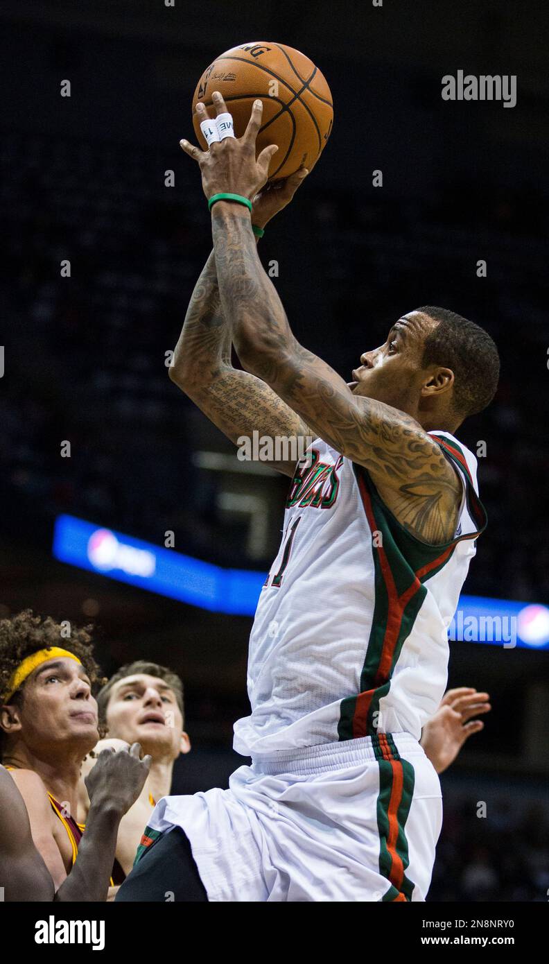 Milwaukee Bucks' Monta Ellis shoots over Cleveland Cavaliers' Anderson ...