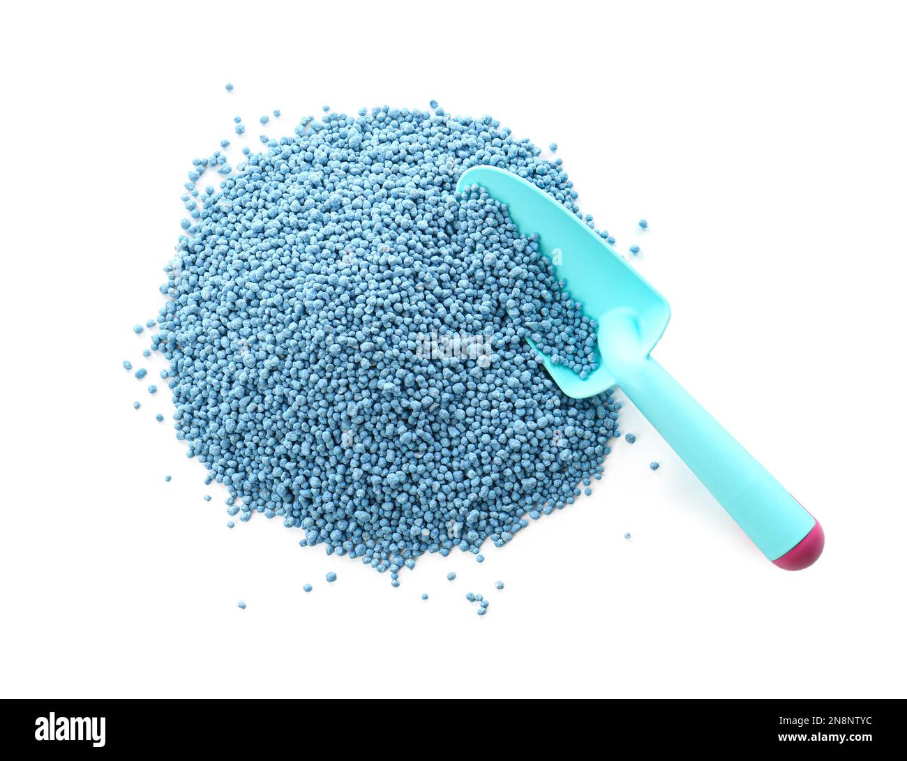 Pile of granular mineral fertilizer and shovel on white background, top ...