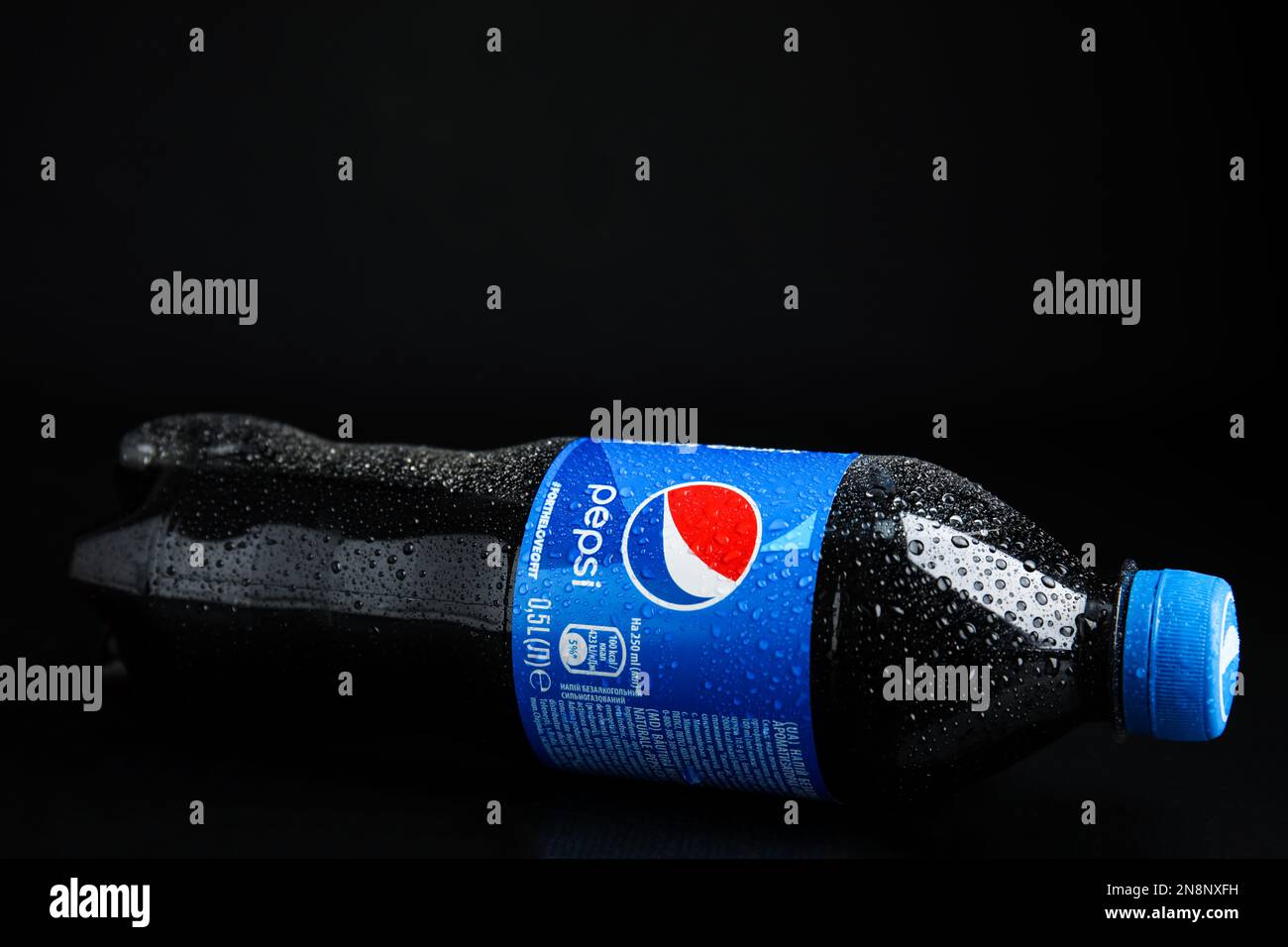 MYKOLAIV, UKRAINE - FEBRUARY 08, 2021: Plastic bottle of Pepsi with ...