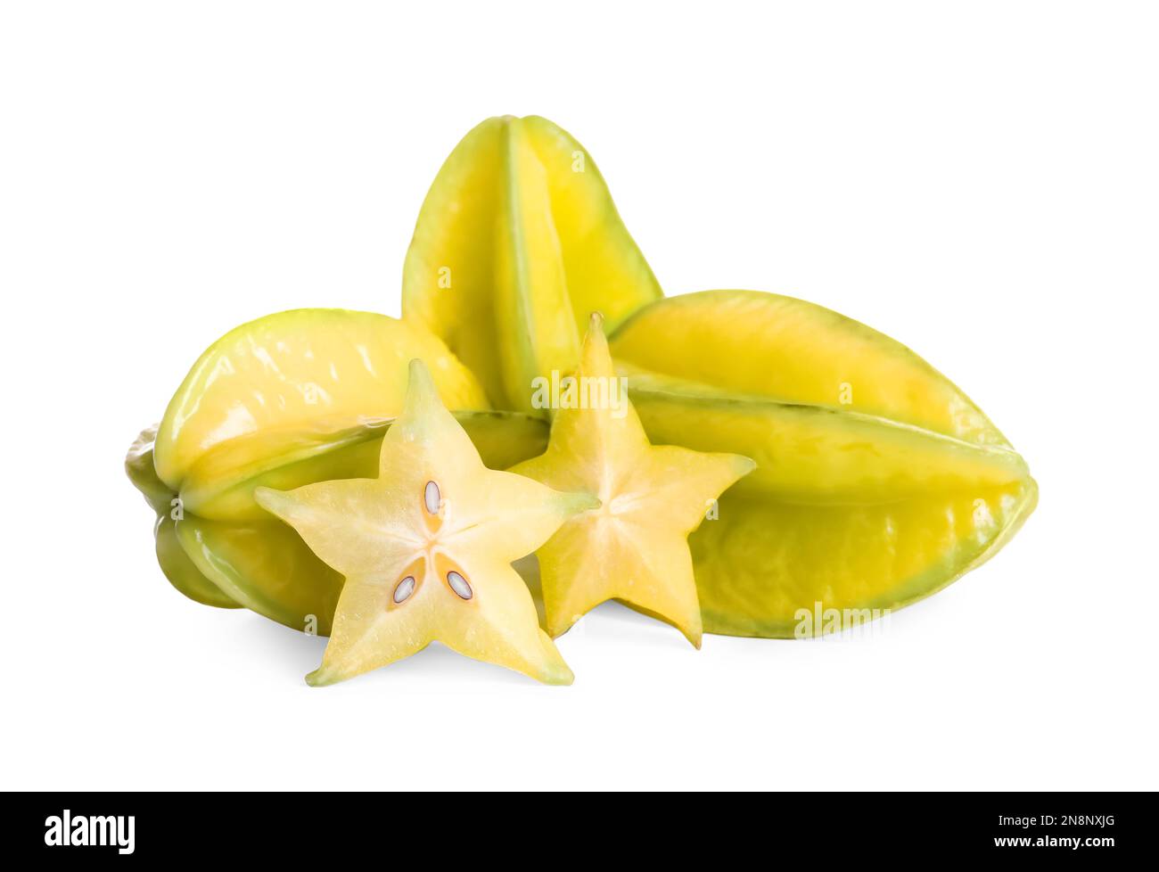 Cut and whole carambolas on white background Stock Photo - Alamy