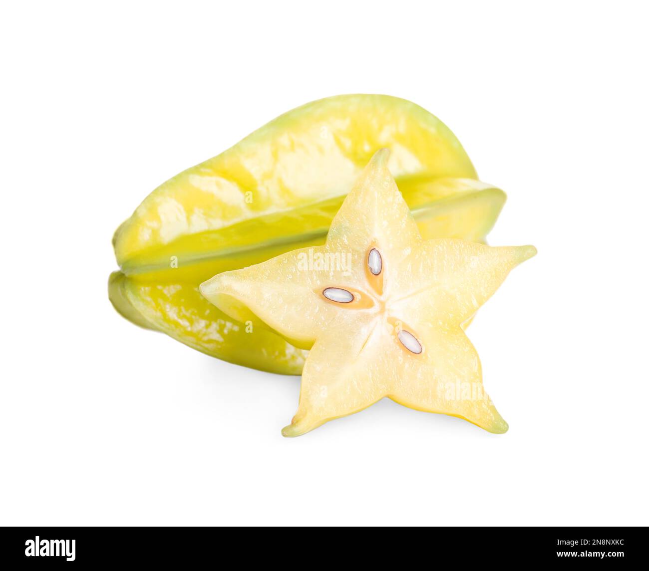 Cut and whole carambolas on white background Stock Photo - Alamy