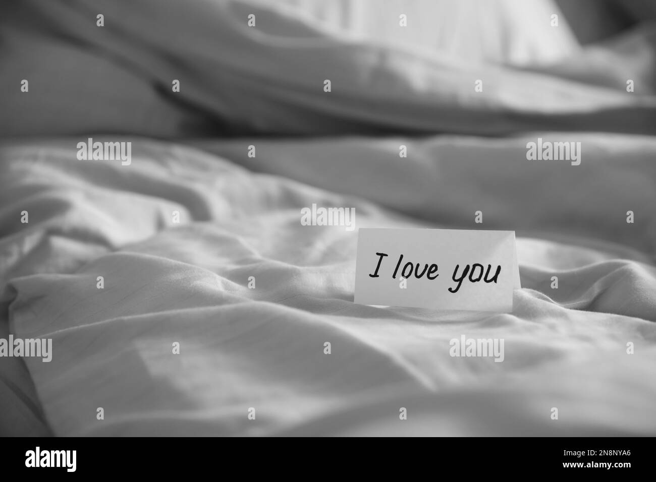Note with text I Love You on bed. Romantic message Stock Photo - Alamy