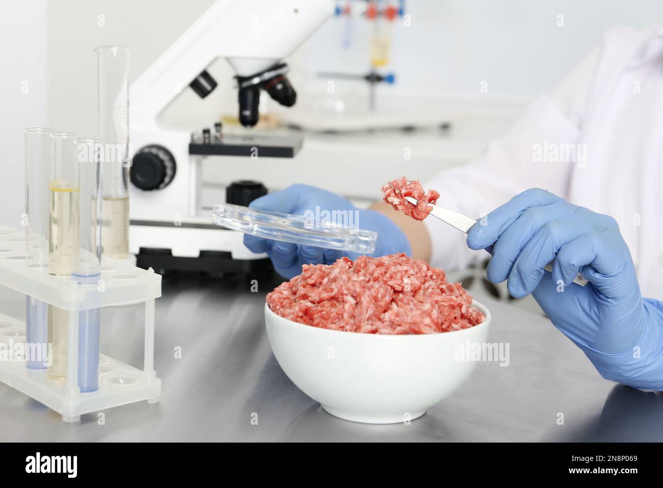 Inspecting experiment in laboratory hi-res stock photography and images ...