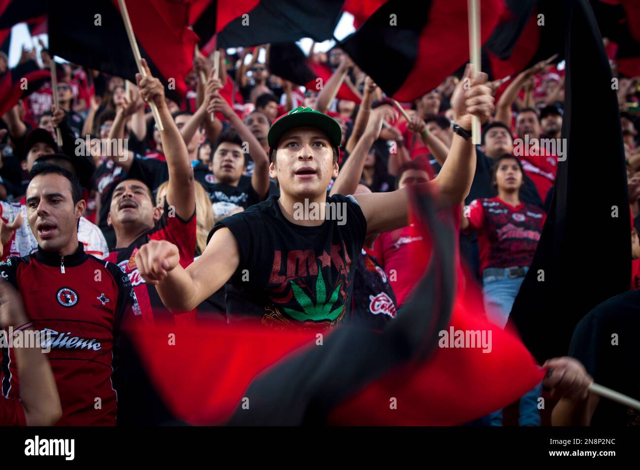In this Oct. 7, 2012 photo, fans of the soccer team Xoloitzcuintles of ...