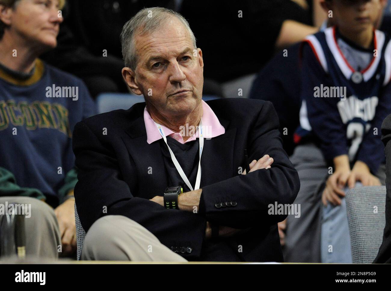 Former Connecticut head coach Jim Calhoun watches a men's NCAA ...