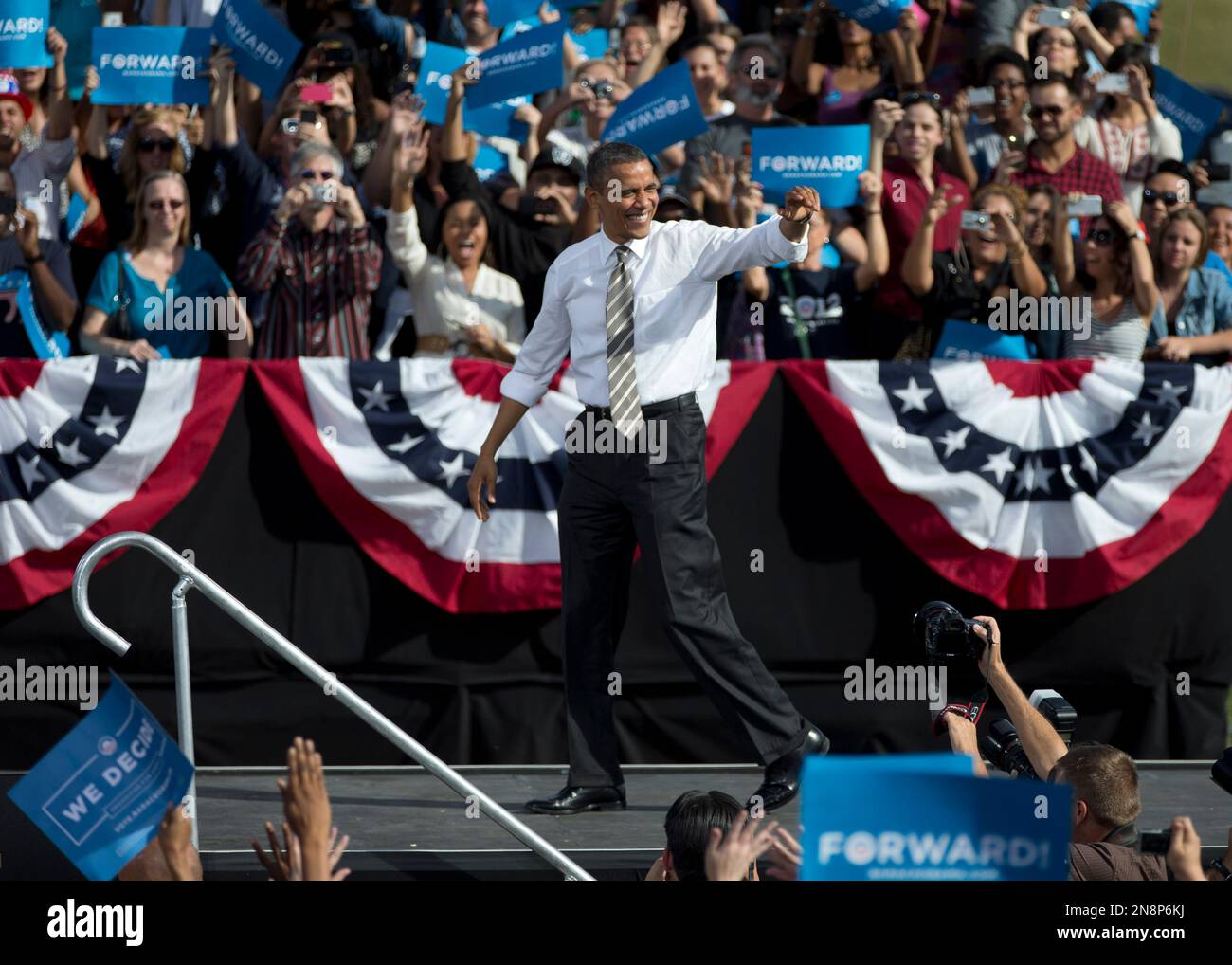 President Barack Obama arrives to speak at a campaign event, Thursday ...
