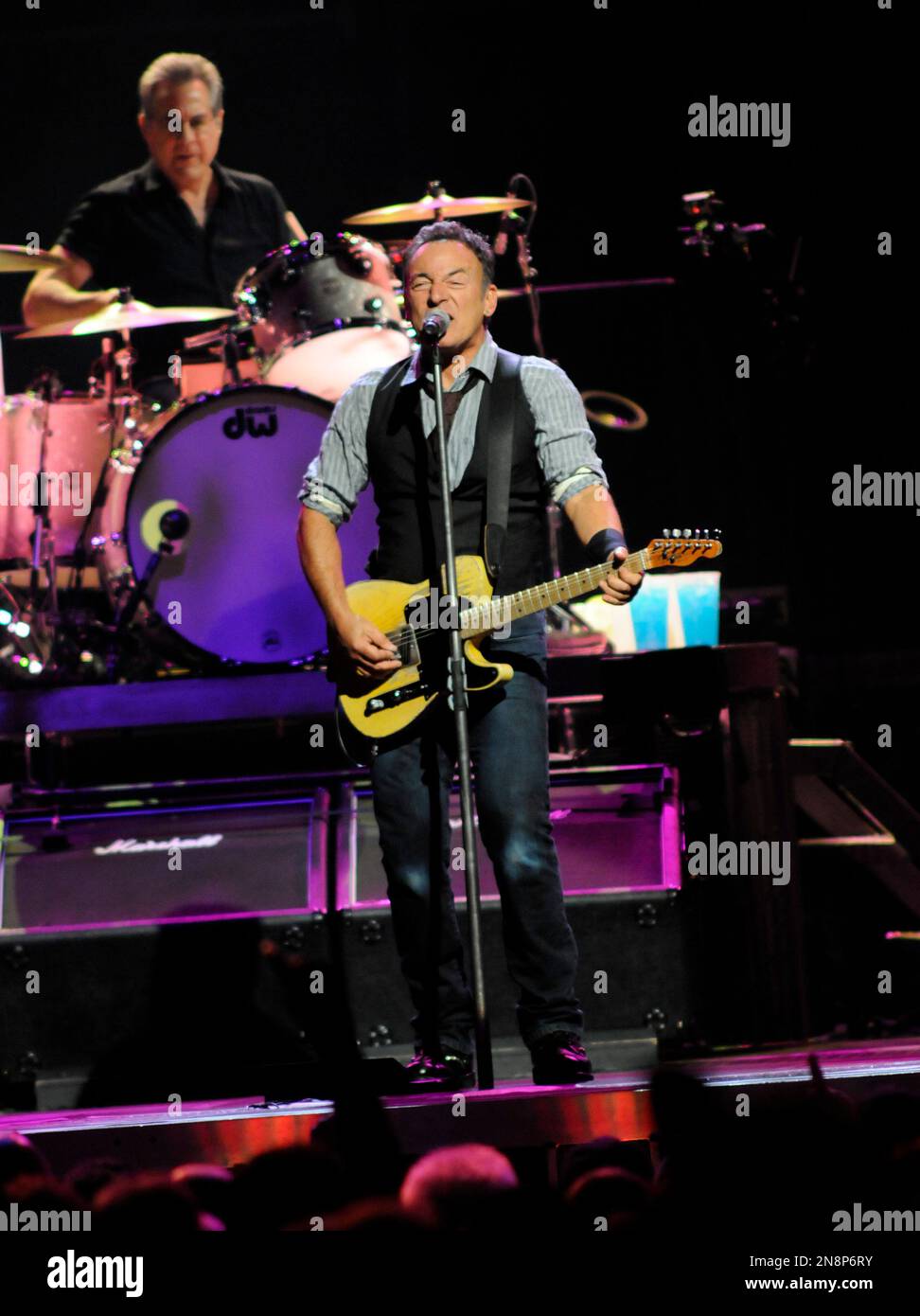 Bruce Springsteen performs in concert with Max Weinberg on drums and ...