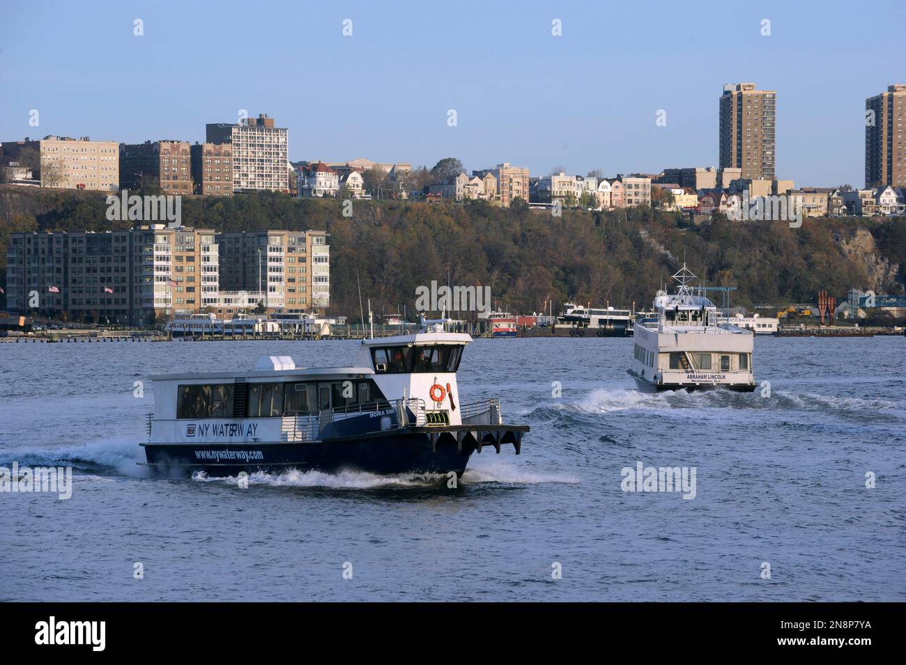 New York Waterway ferries carry commuters across the Hudson River to ...
