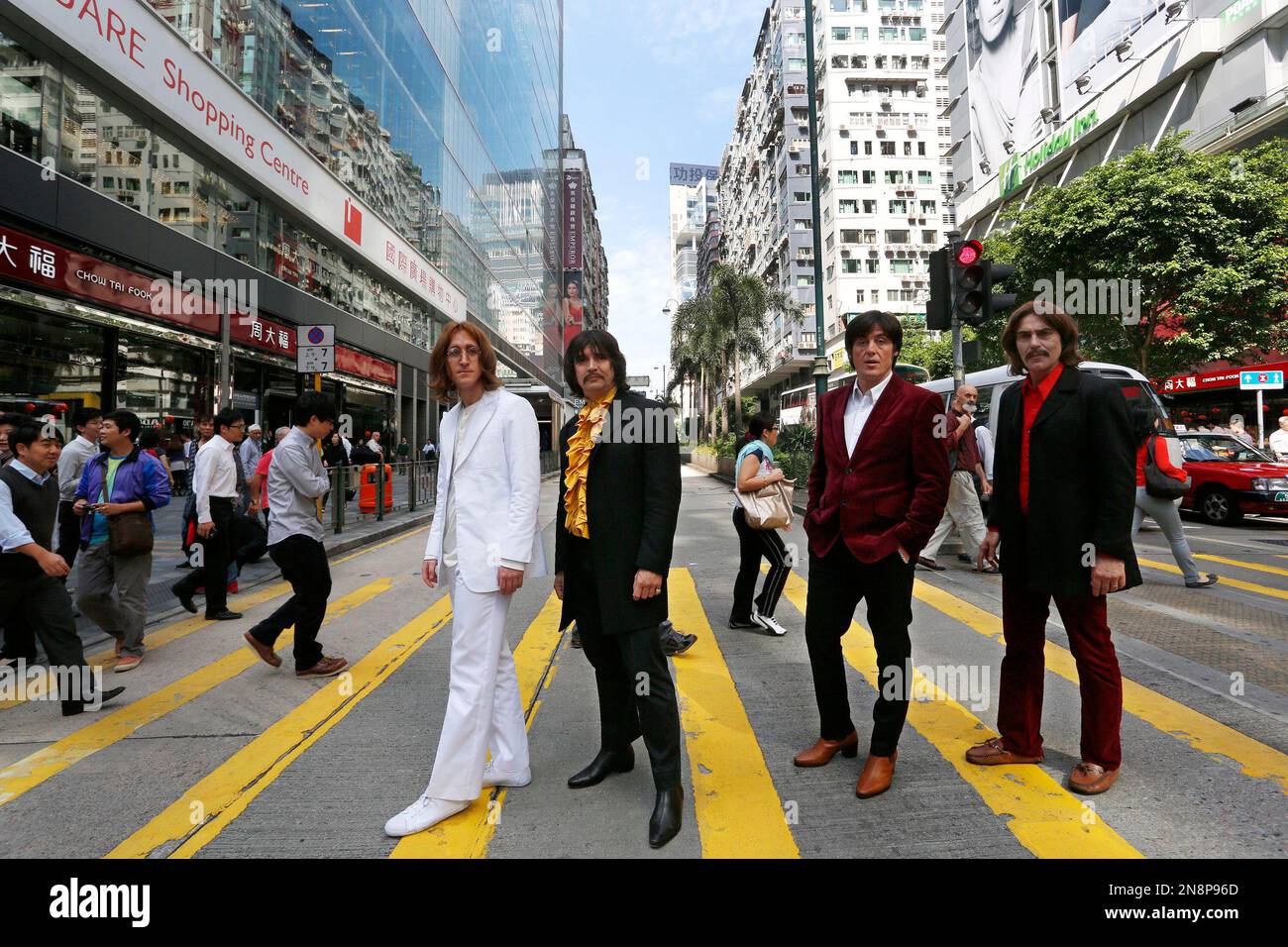 The Bootleg Beatles' members, from left, Adam Hastings plays John ...