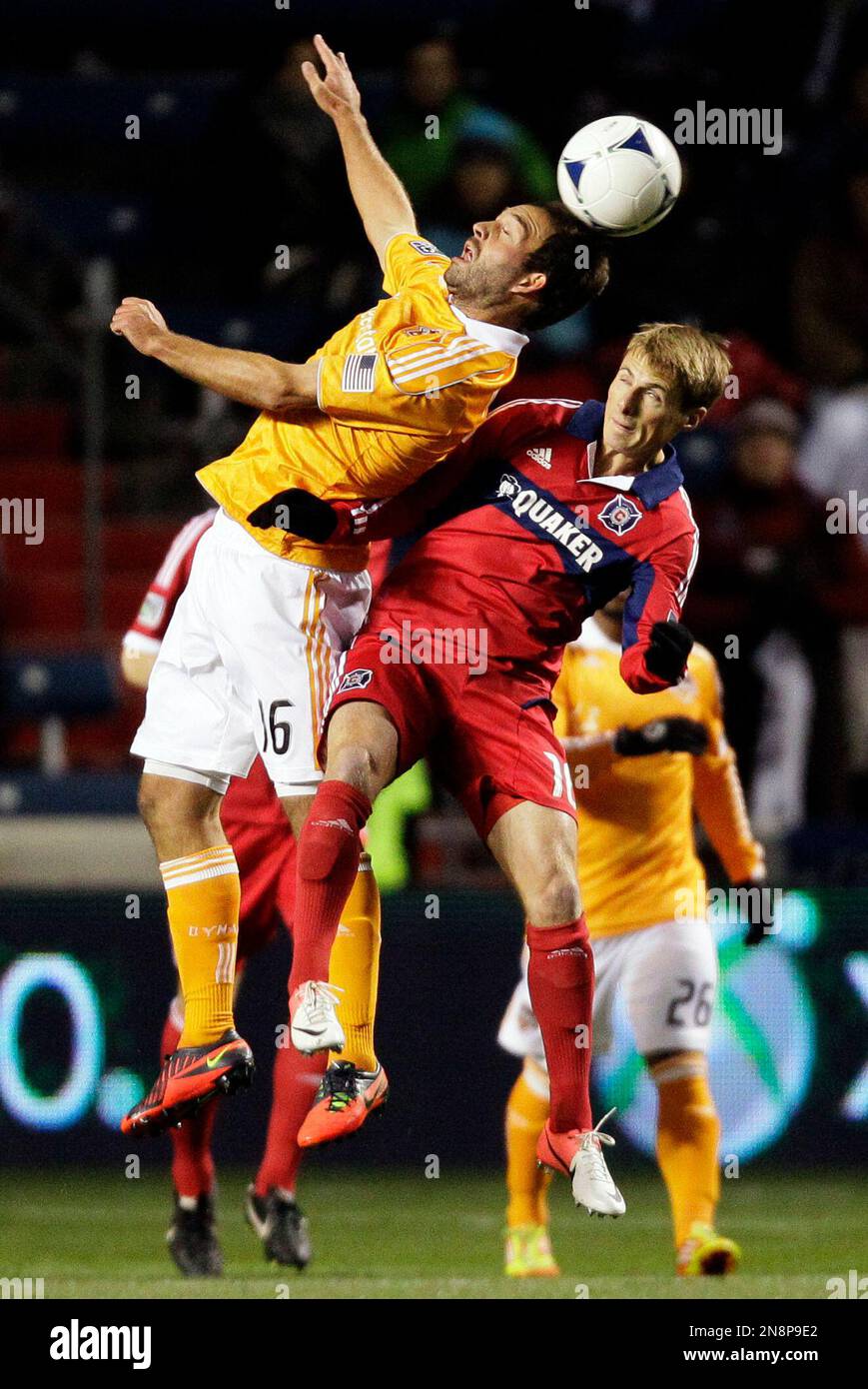 Houston Dynamo midfielder Adam Moffat (16) and Chicago Fire forward ...