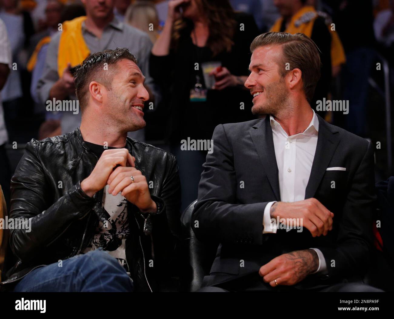 Los Angeles Galaxy's Robbie Keane, left, and David Beckham attend an ...