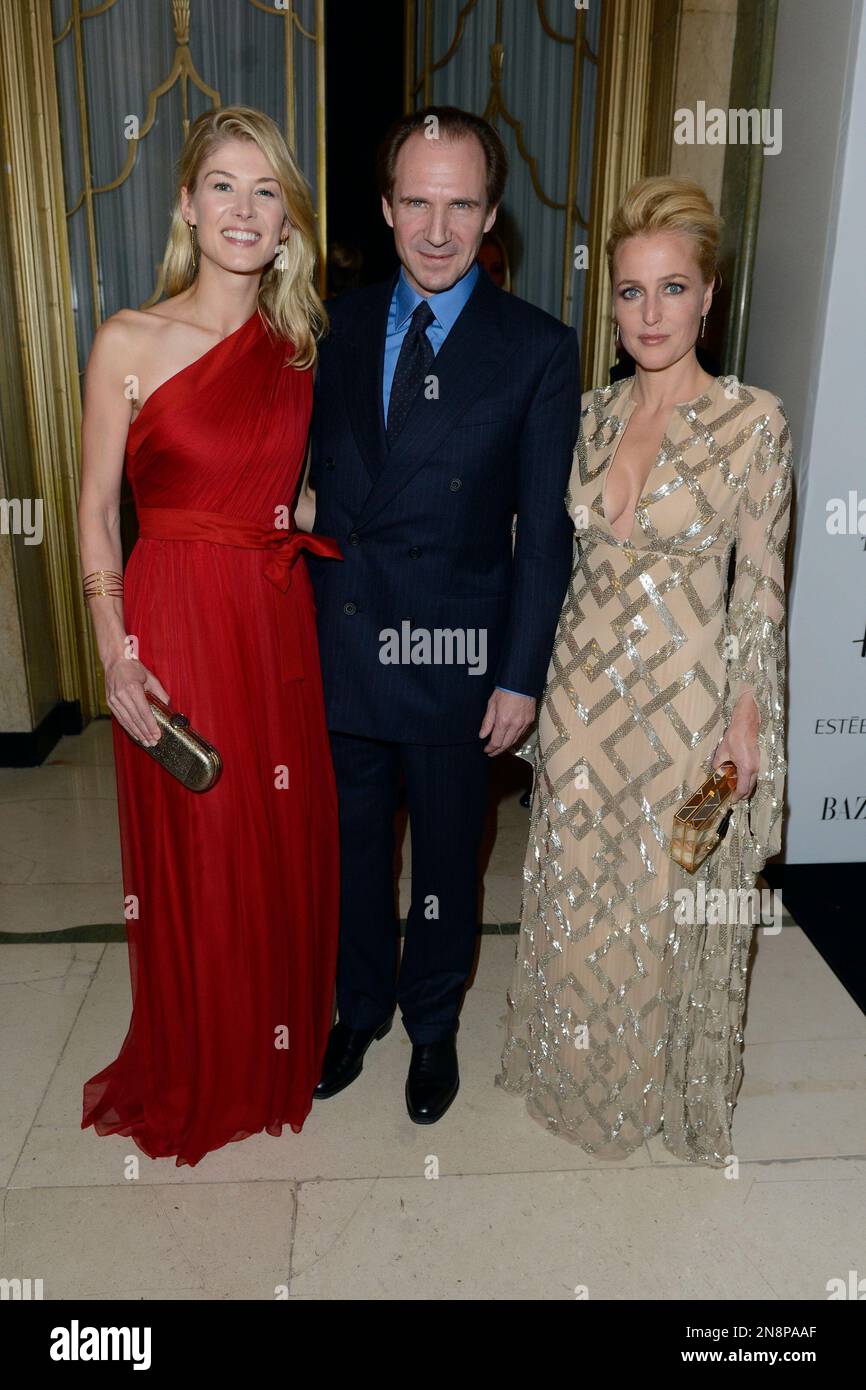 From left, Rosamund Pike, Ralph Fiennes and Gillian Anderson are seen ...