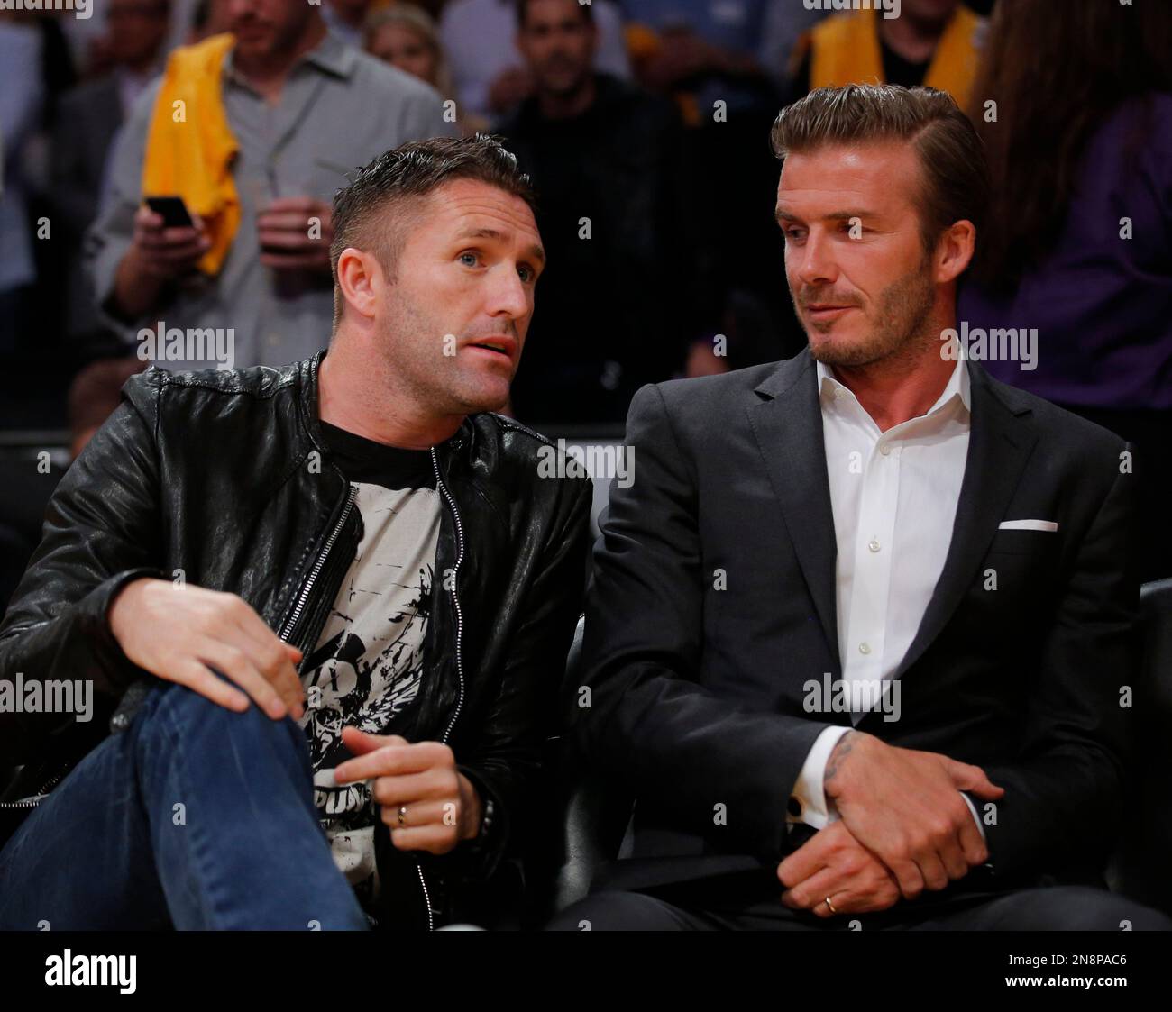 Los Angeles Galaxy's Robbie Keane, left, and David Beckham attend an ...
