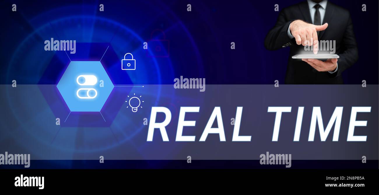 Hand writing sign Real Time. Business concept the actual time during ...