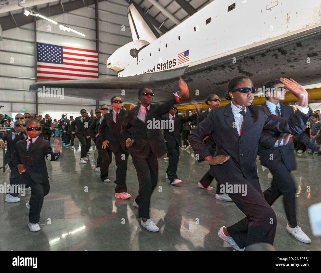 Children dance for the opening of the space shuttle Endeavour at the ...