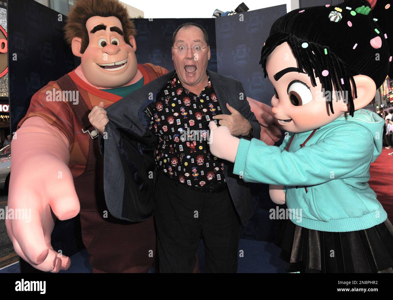John Lasseter arrives at the world premiere of "Wreck-It Ralph" at El ...