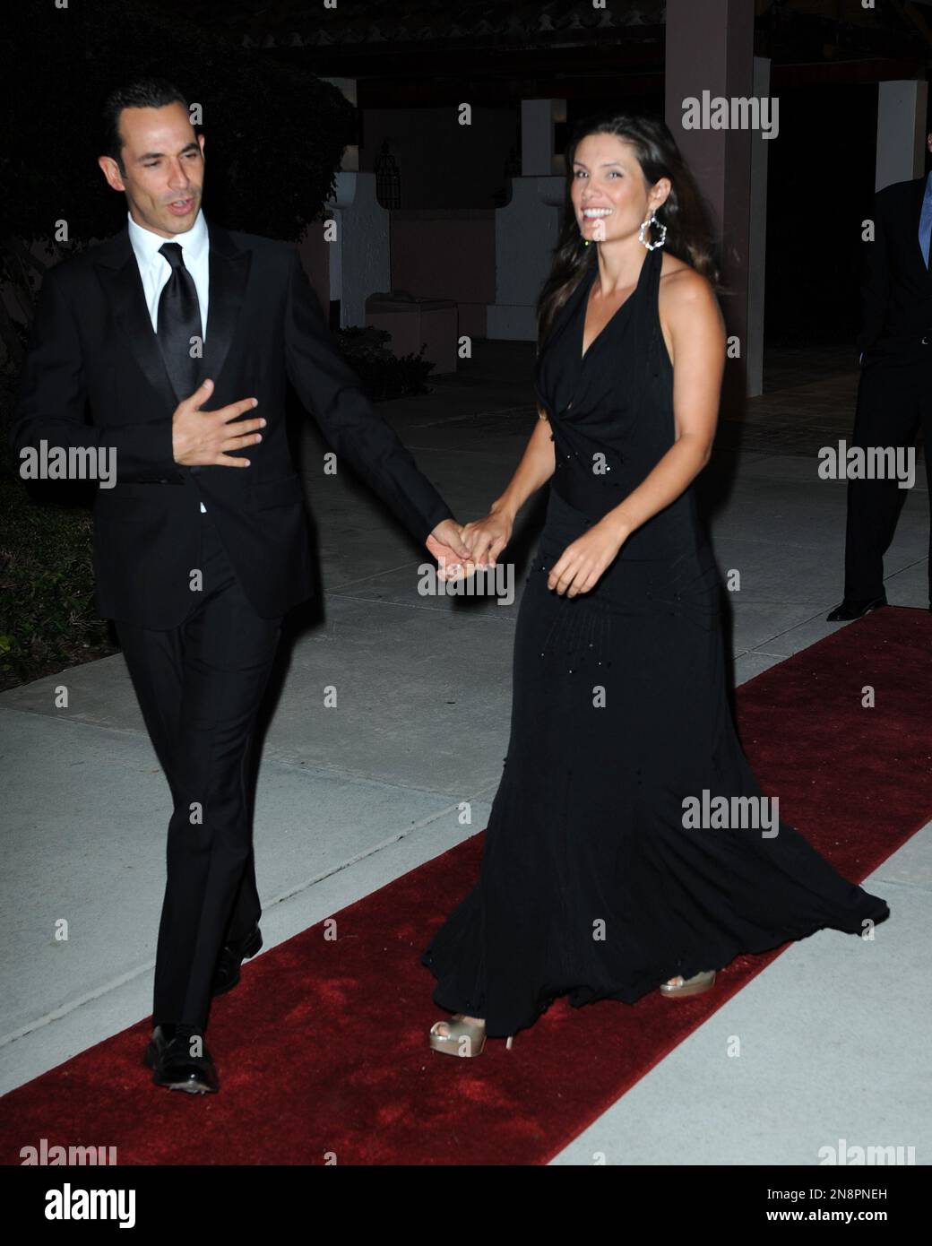 Helio Castroneves and Adriana Henao arrive at 23rd Annual Chris Evert ...