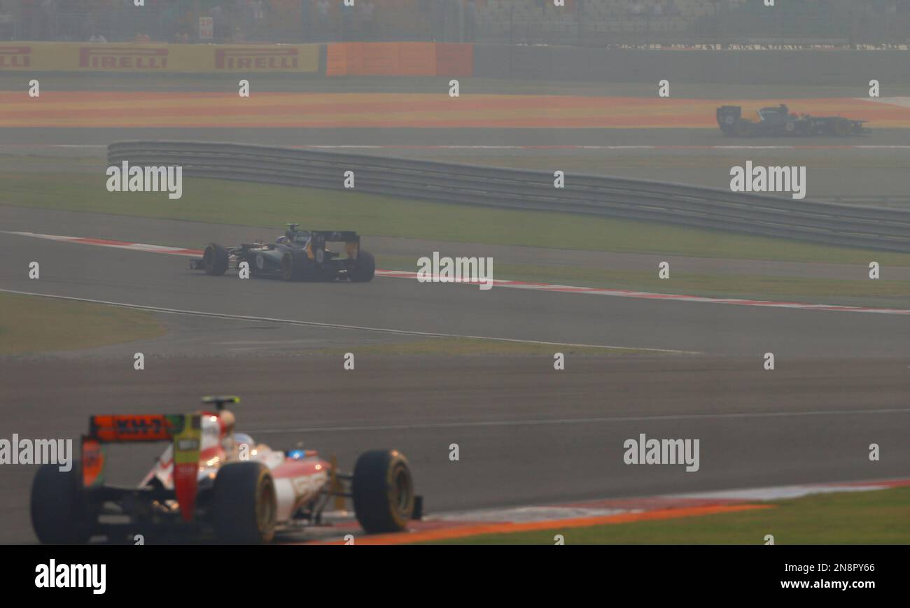 Cars race on the Buddh International Circuit during the Indian Formula ...