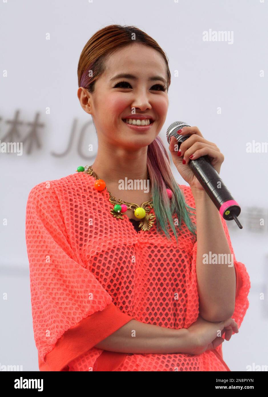 Taiwanese singer Jolin Tsai smiles as she promotes her new album "Muse ...