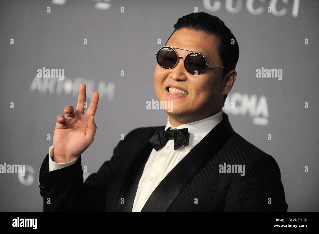 South Korean rapper Psy arrives at the 2012 ART + FILM GALA hosted by ...