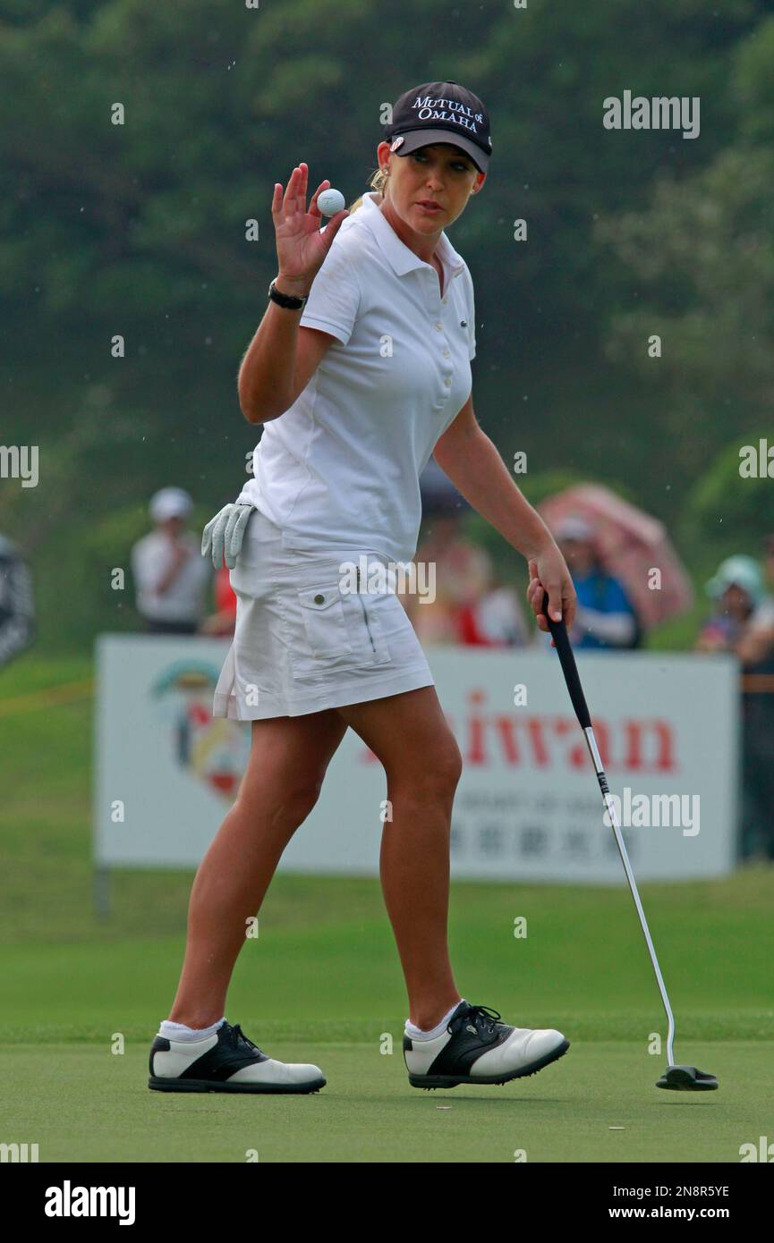 Cristie Kerr of the United States, waves to fans with her ball on the ...