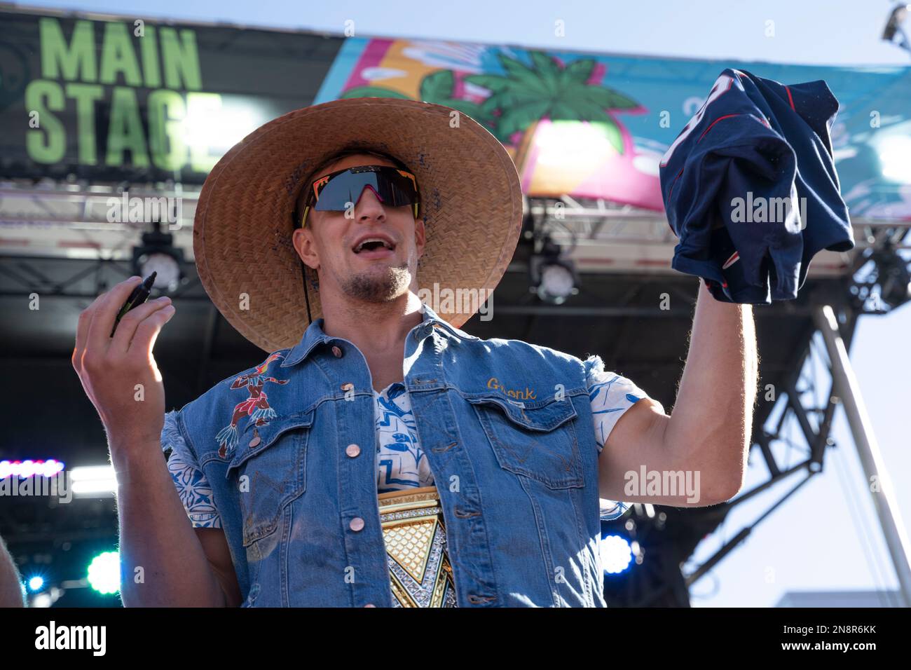 Rob Gronkowski signs autographs from the stage at Gronk Beach music ...