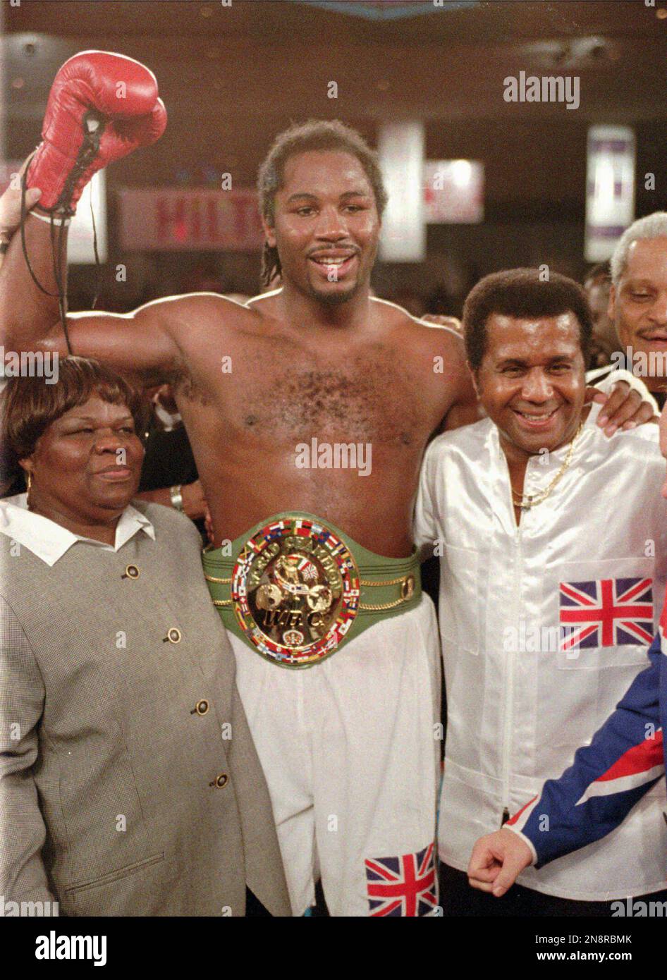 File-This Feb. 7, 1997 file photo shows newly crowned WBC heavyweight ...