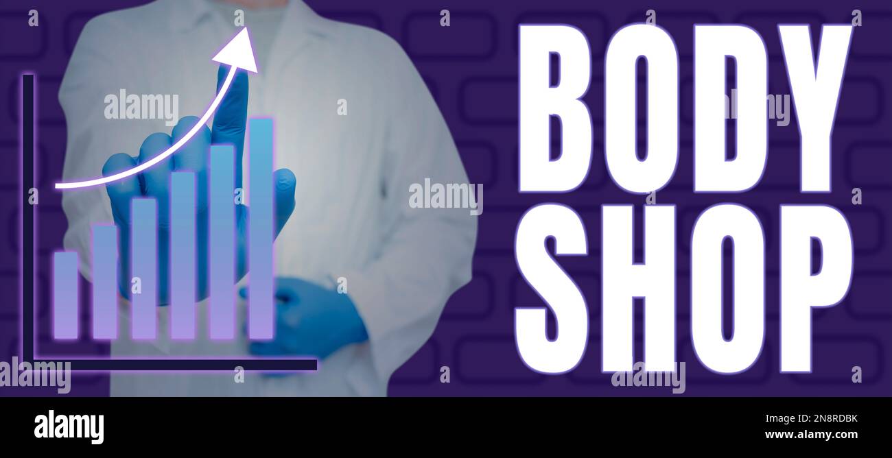 Hand writing sign Body Shop. Word for a shop where automotive bodies ...