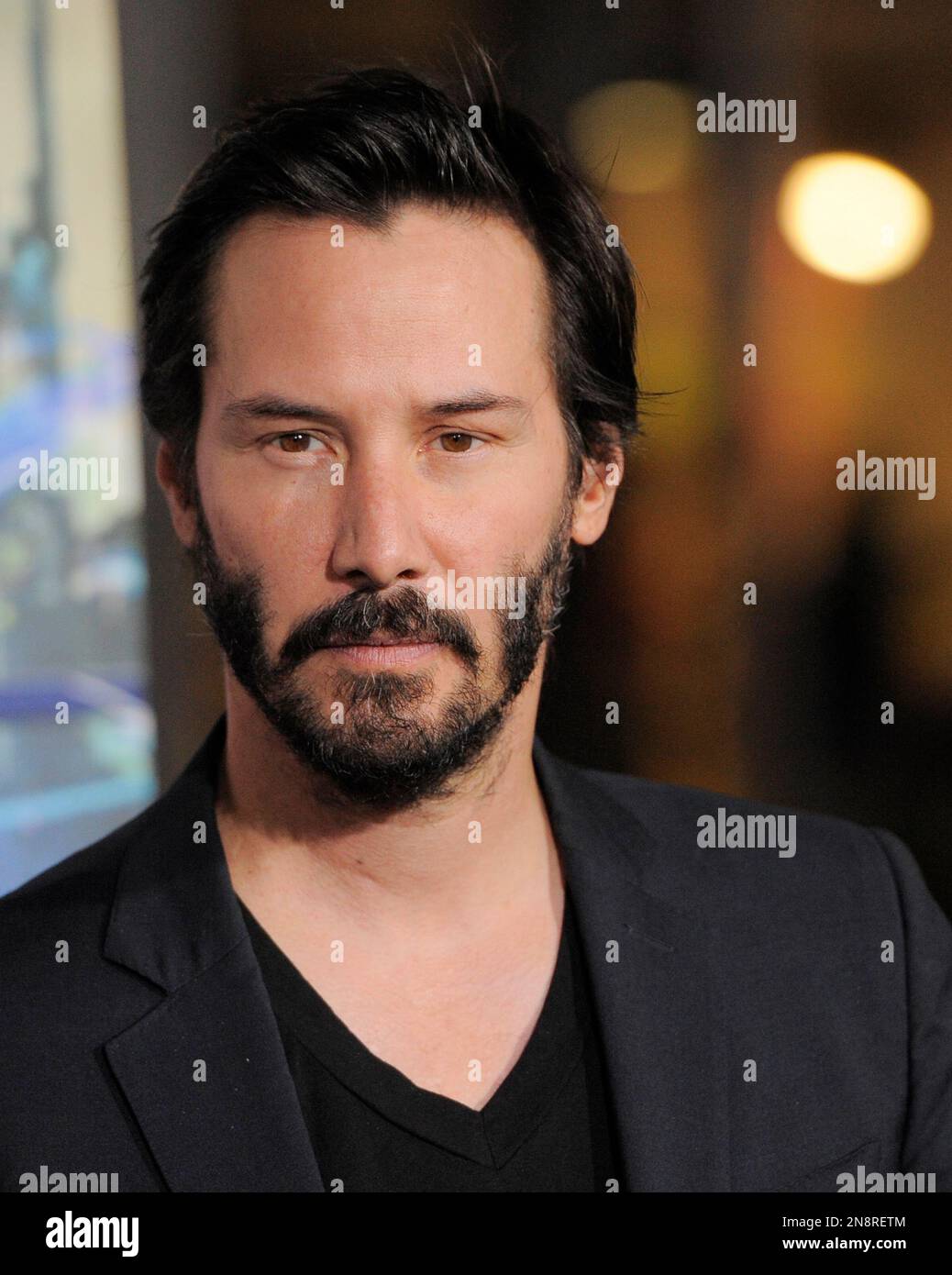 Keanu Reeves poses at the premiere of the film "Cloud Atlas" at Grauman ...