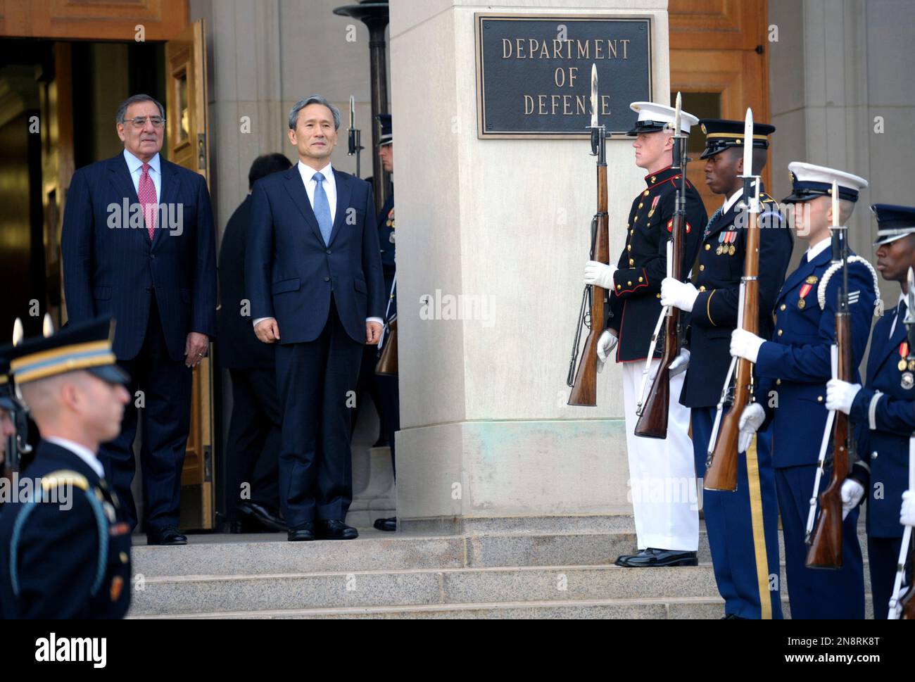Defense Secretary Leon Panetta, left, and South Korean Defense Minister Kim Kwan-Jin stand at ...