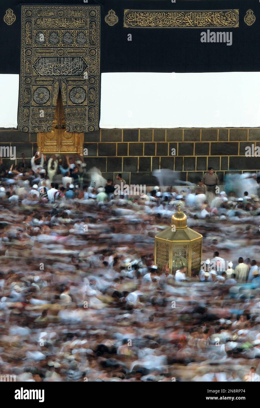 Muslim pilgrims circle the Kaaba as pray inside the Grand mosque in the ...