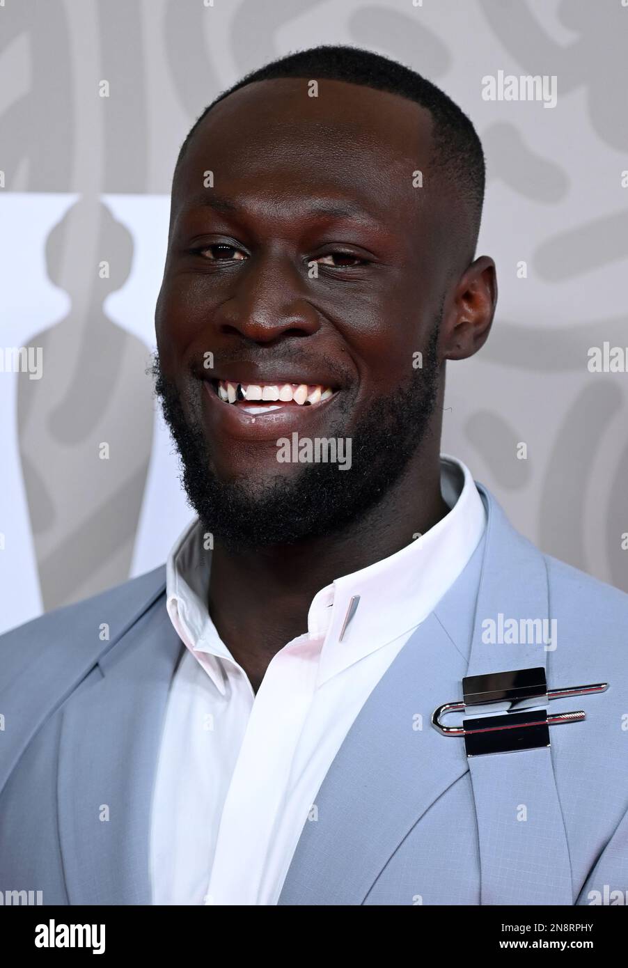 EDITORIAL USE ONLY February 11th, 2023, London, UK. Stormzy arriving at ...
