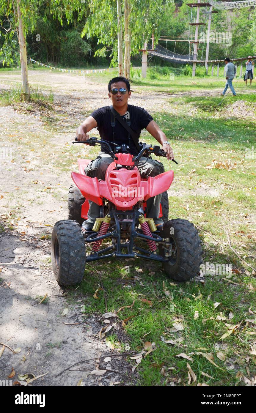 Travelers young thai men biking and riding ATV motorcycle auto or All ...