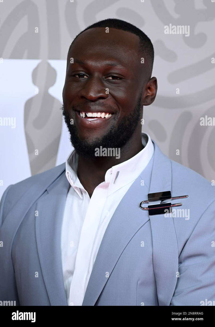 EDITORIAL USE ONLY February 11th, 2023, London, UK. Stormzy arriving at ...