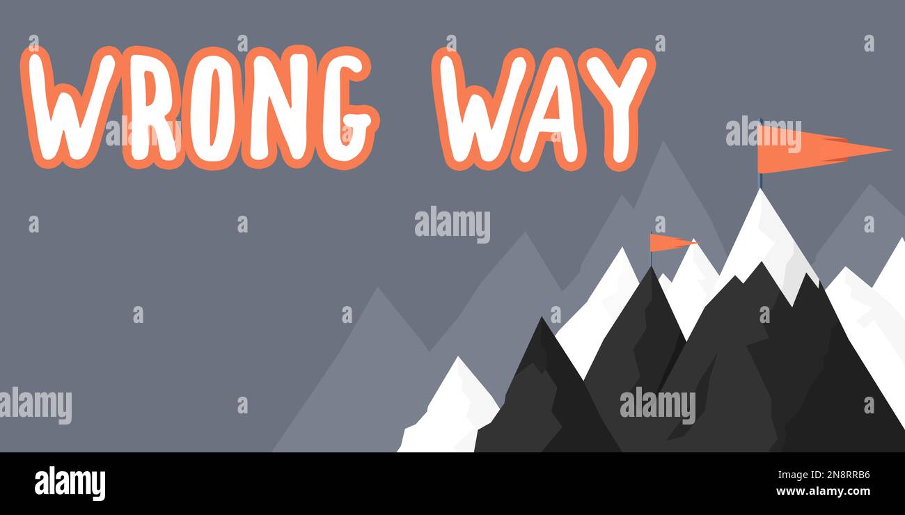 Text sign showing Wrong Way. Concept meaning taking an unsuitable or ...