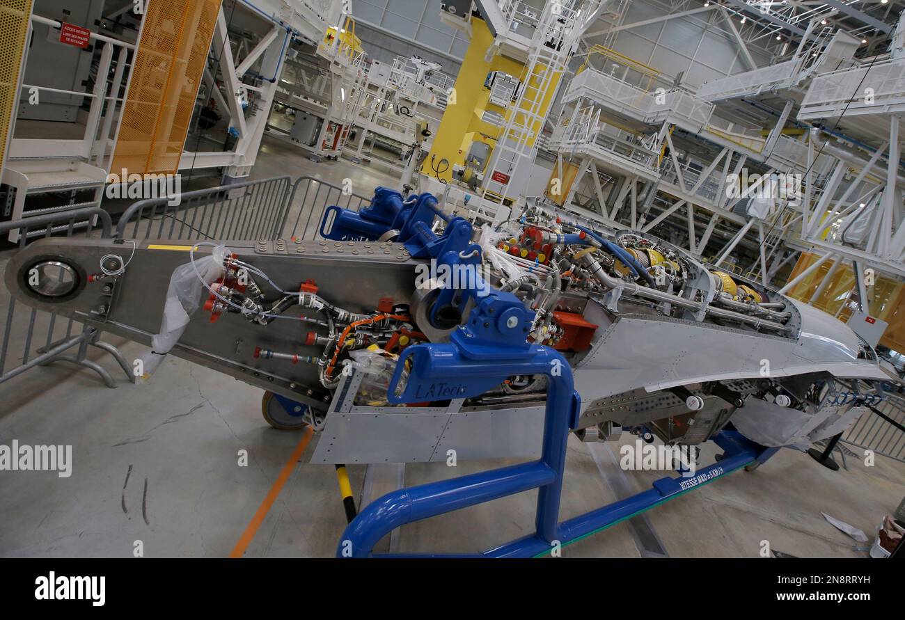 The pylon section which holds the engine under the wing of the first ...