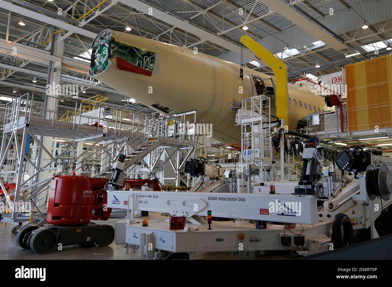 The tail section of the first Airbus A350 XWB plane is seen on the ...