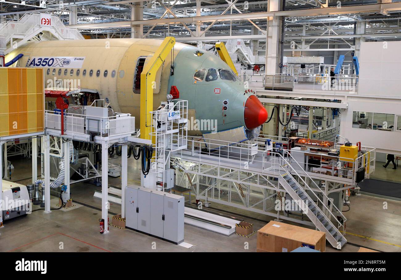 The nose section of the first Airbus A350 XWB plane is seen on the ...