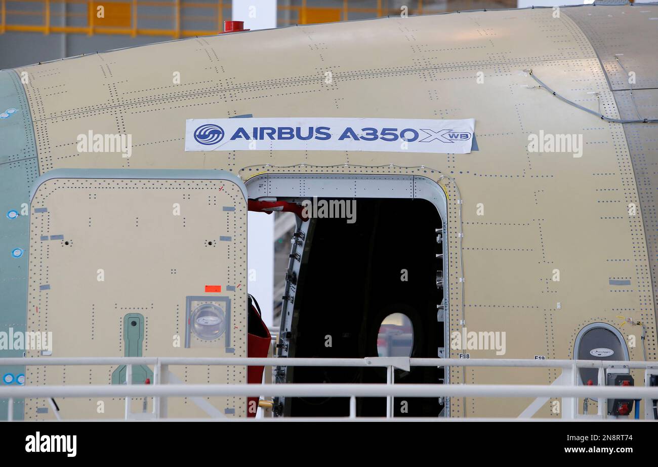 The front aircraft door of the first Airbus A350 XWB plane is seen on ...