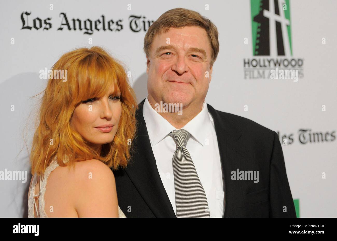 Actors Kelly Reilly, left, and John Goodman pose together at the 16th ...