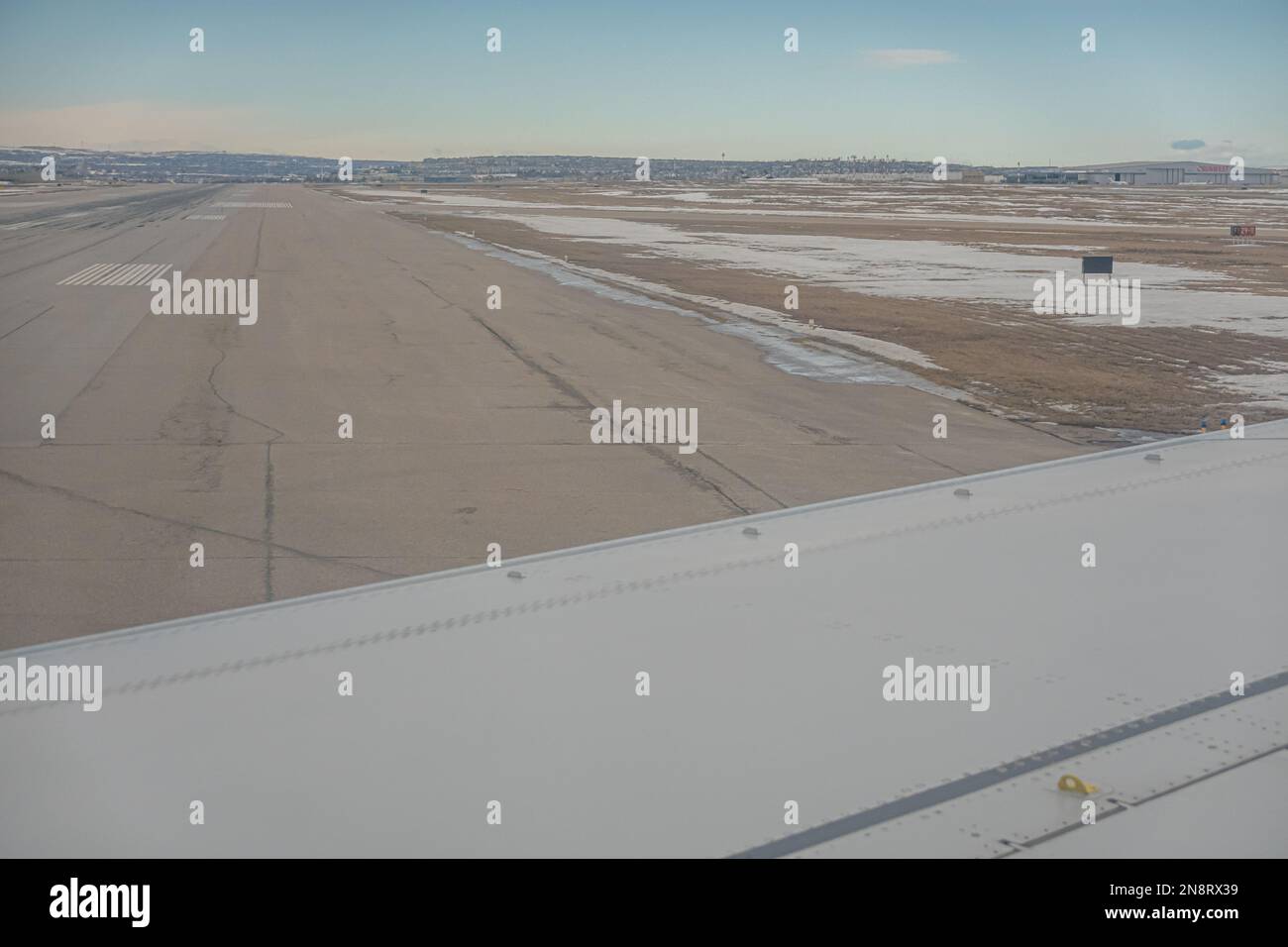 Airline jet turning into airport runway for departure Stock Photo - Alamy