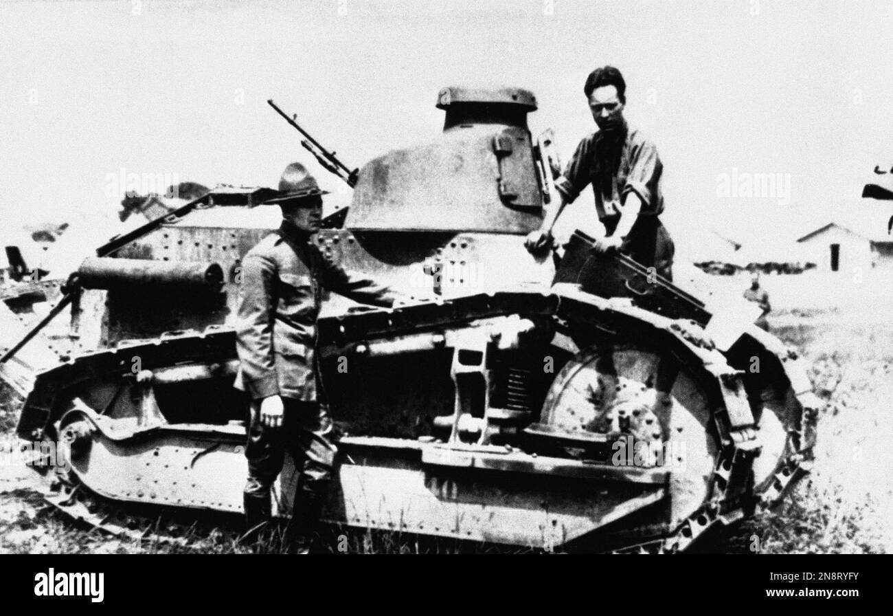 Capt. Dwight D. Eisenhower, left, Commander of Camp Colt, and Lt. Owens ...