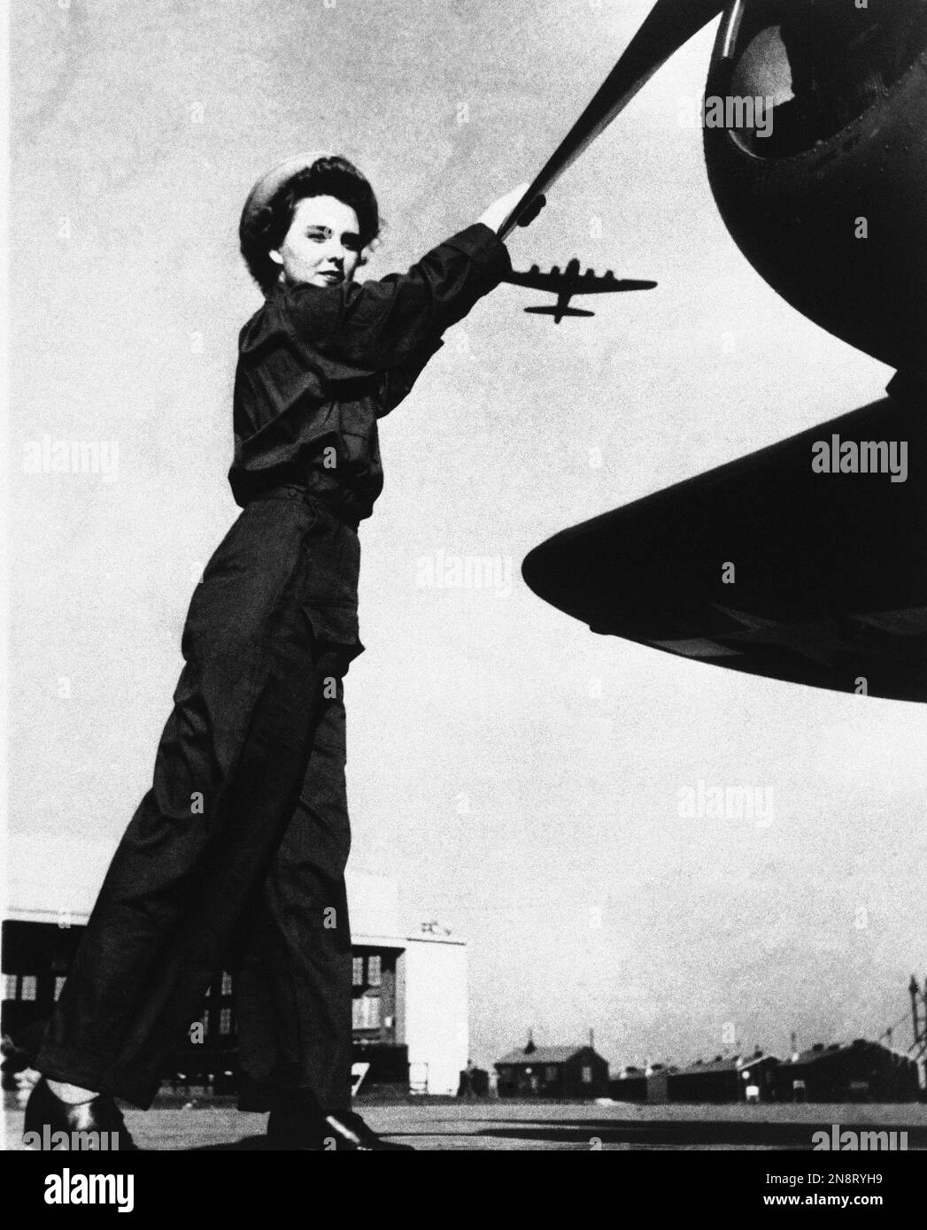 A member of the Women's Army Corps spins a propeller at Wright Field ...