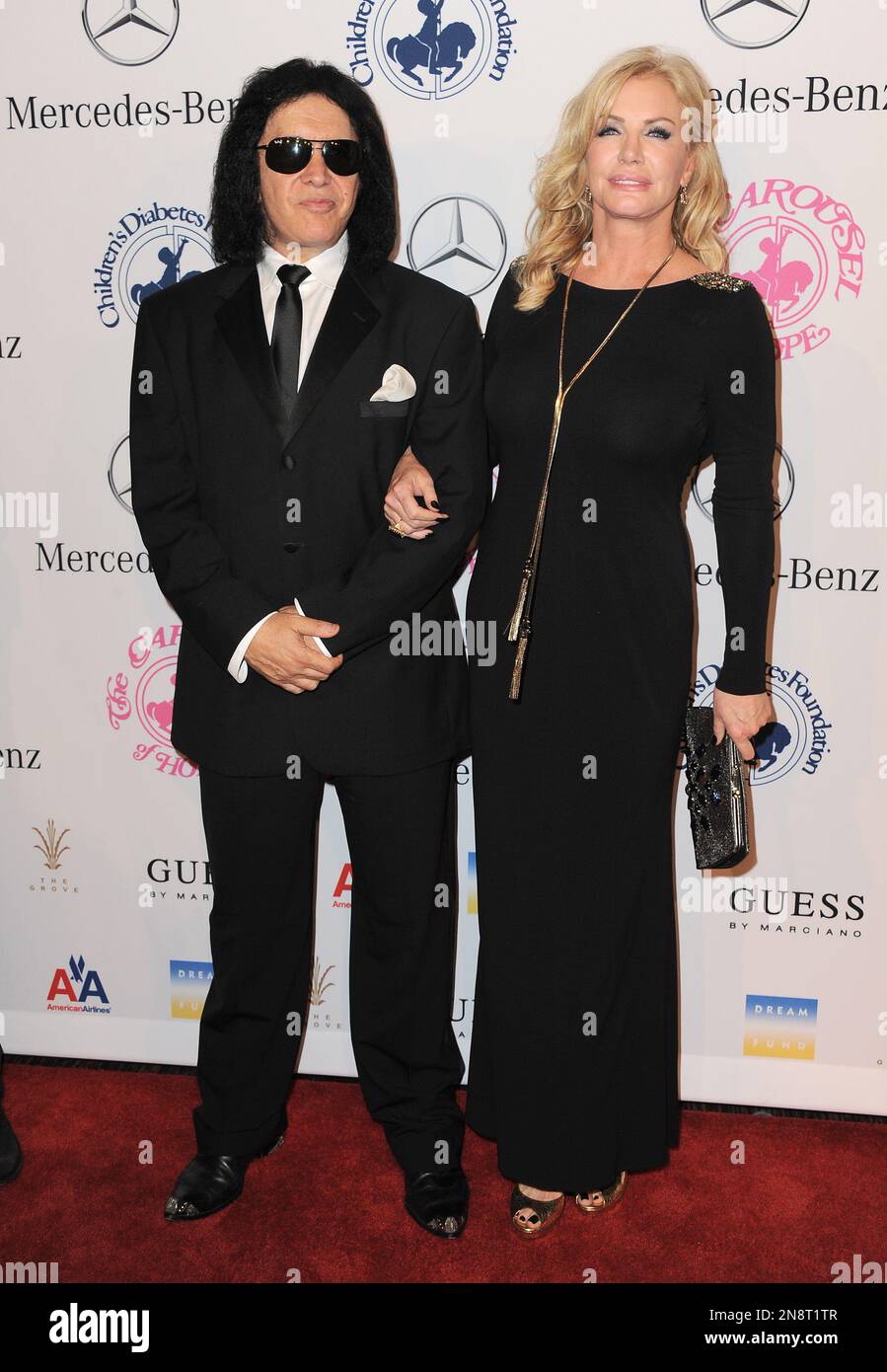 Gene Simmons of the band KISS and Shannon Tweed arrive at The Carousel ...